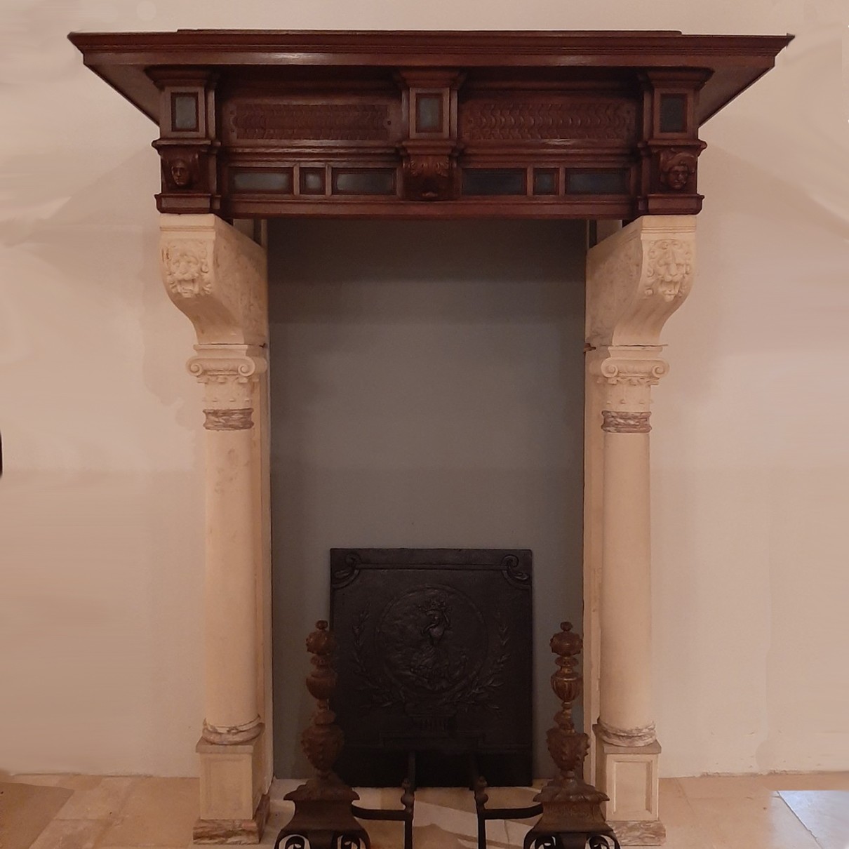 Antique high castle fireplace with sandstone columns - Piet Jonker