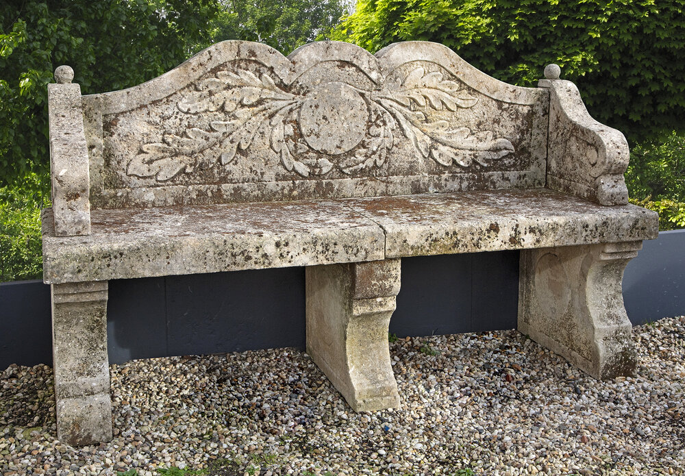 A carved limestone bench - Piet Jonker