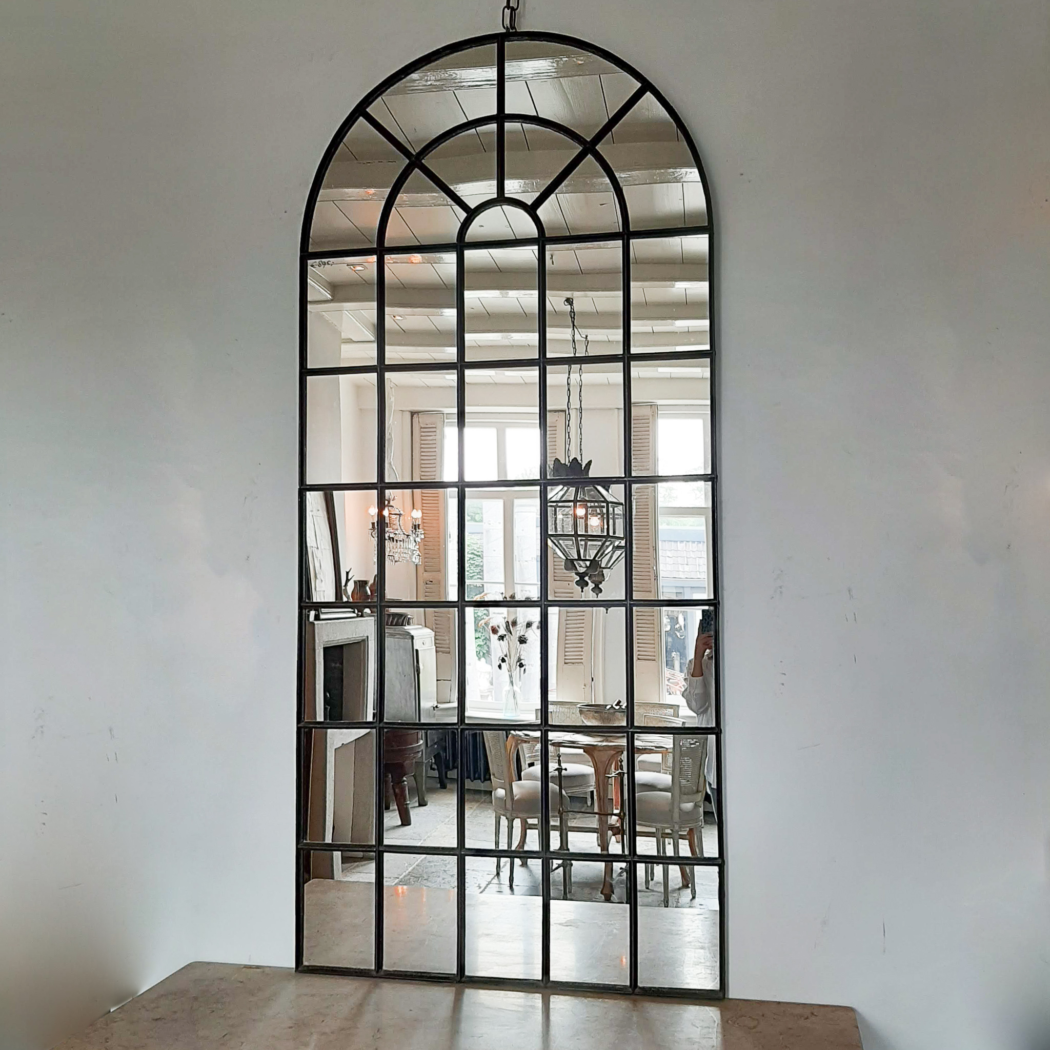 Arched mirrors made from old barn windows - Piet Jonker