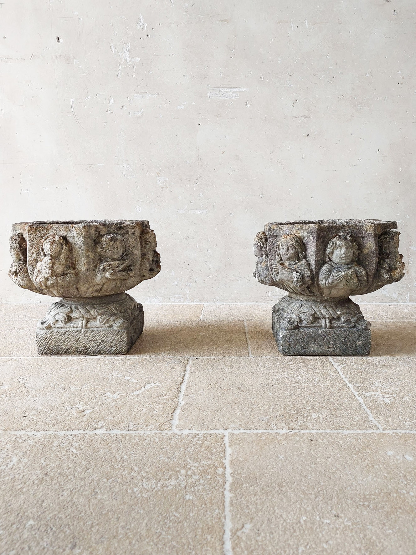 Pair of antique stone planters with angel figures (3 pairs available ...