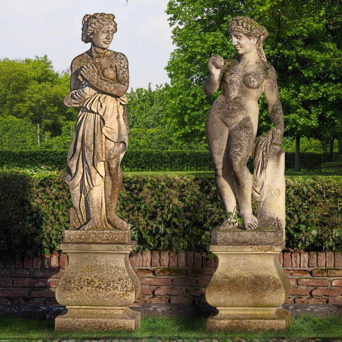 Pair of antique limestone Venus statues with plinths - first quarter ...