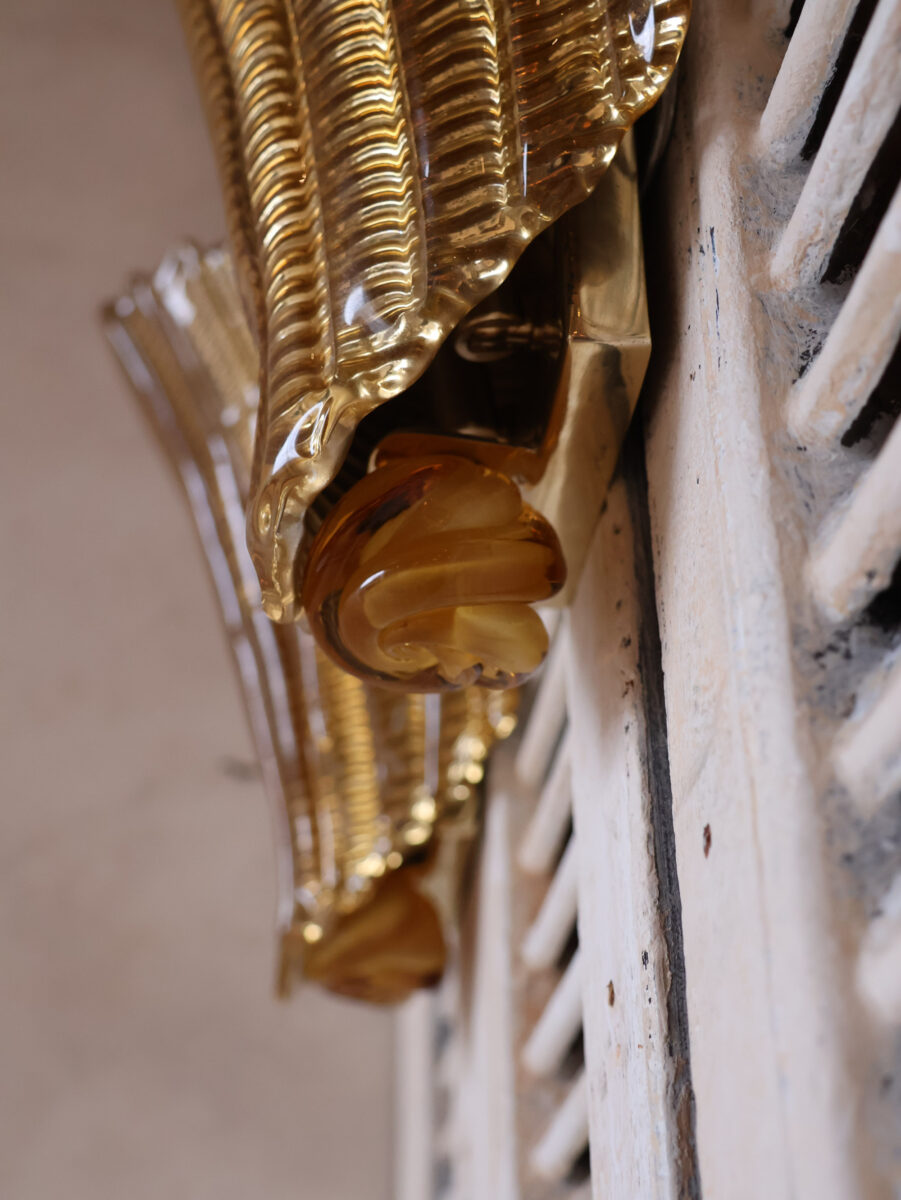 Pair of hand blown Murano shell wall lights amber glass and brass ...