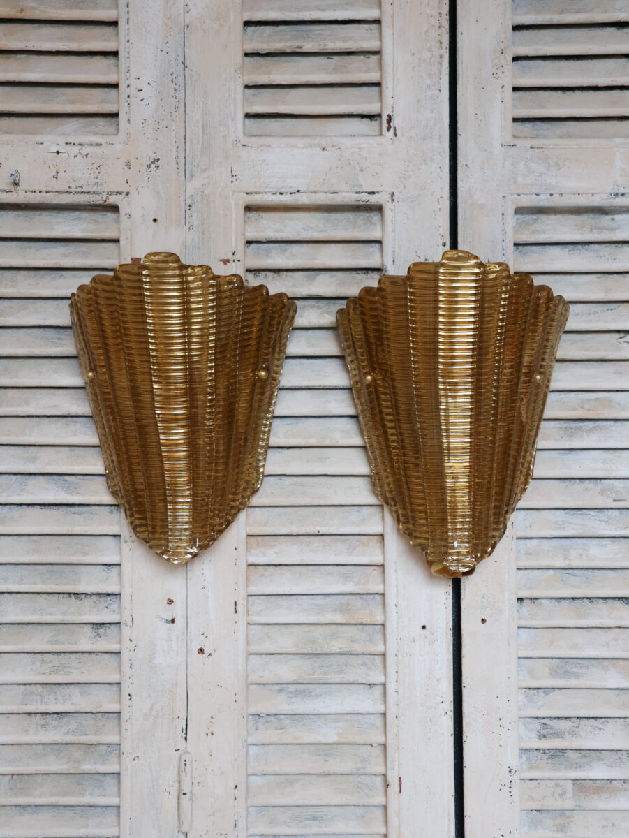 Pair of hand blown Murano shell wall lights amber glass and brass ...
